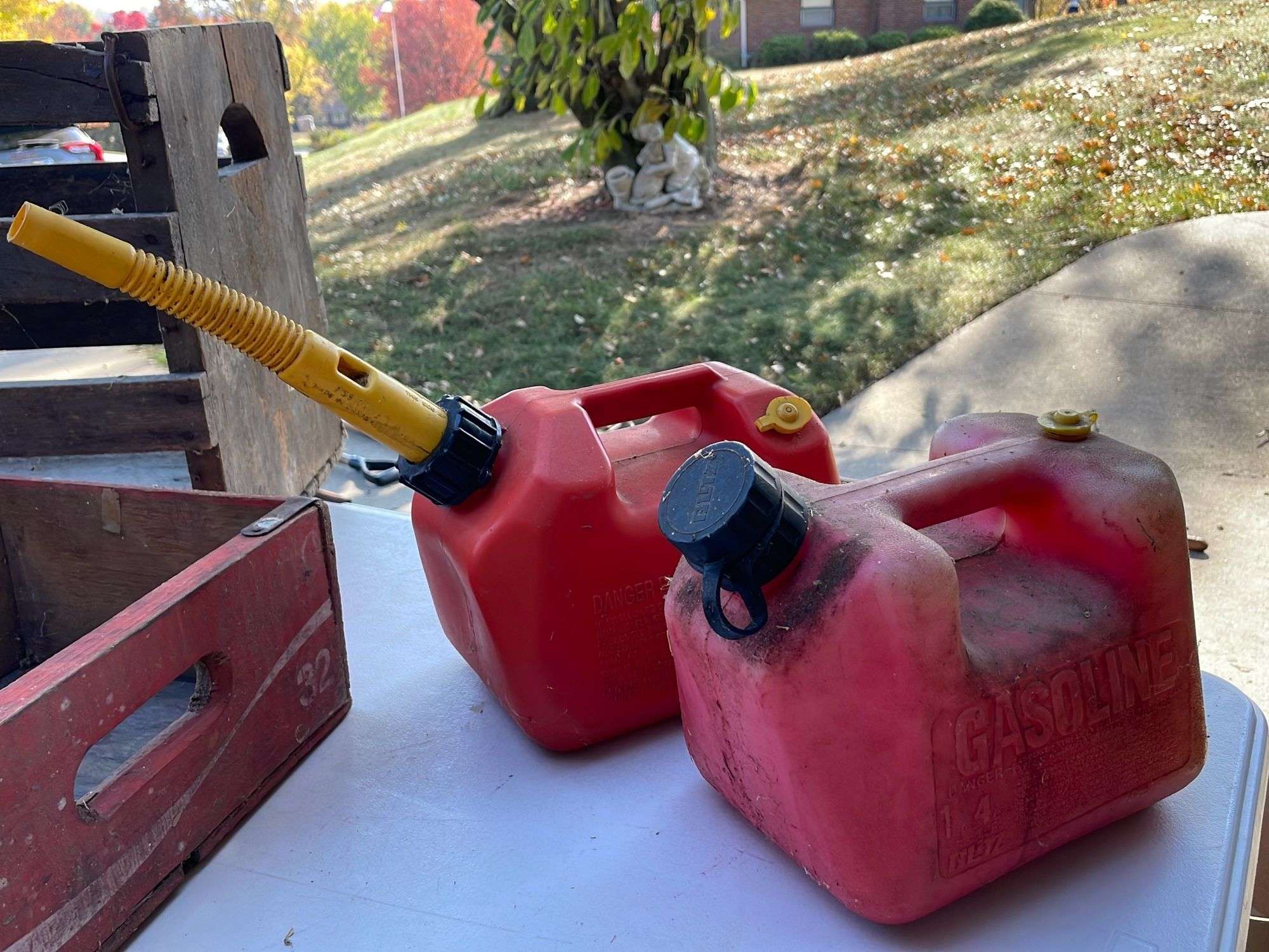 (2) gas cans, Coca Cola crate and other wooden crate - Kaufman Realty ...