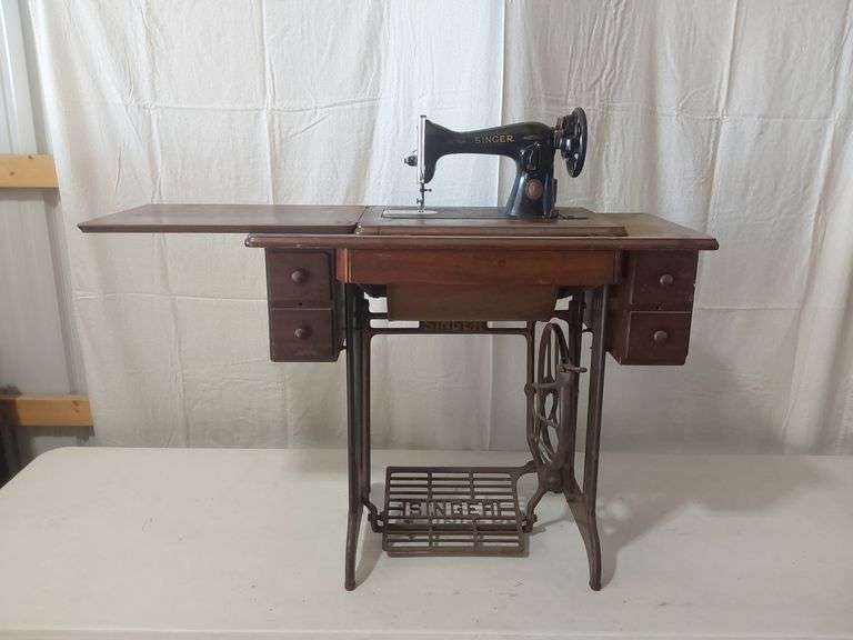 EARLY SINGER SEWING MACHINE AND STAND - Kaufman Realty & Auctions