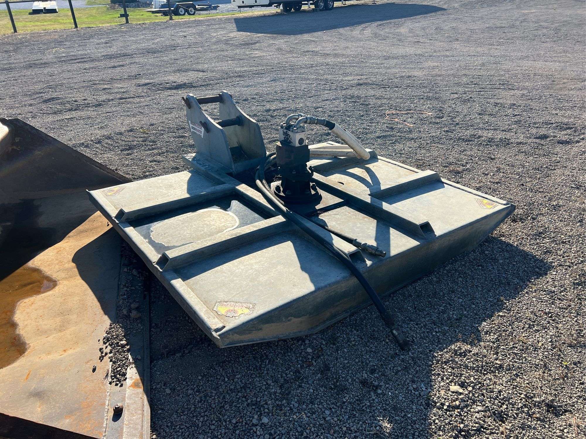 Bush Master brush cutter attachment - Kaufman Realty & Auctions