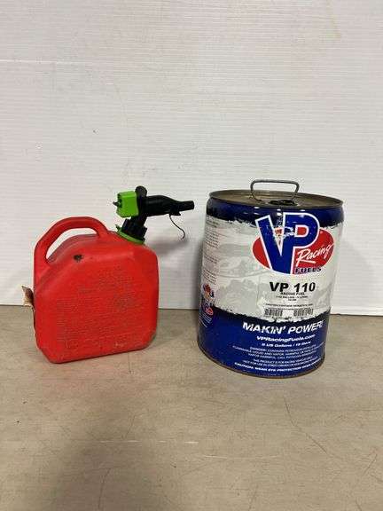2 gallon & tin fuel cans - Kaufman Realty & Auctions