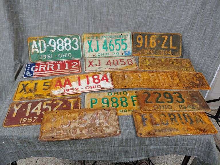 16 old license plates - Kaufman Realty & Auctions