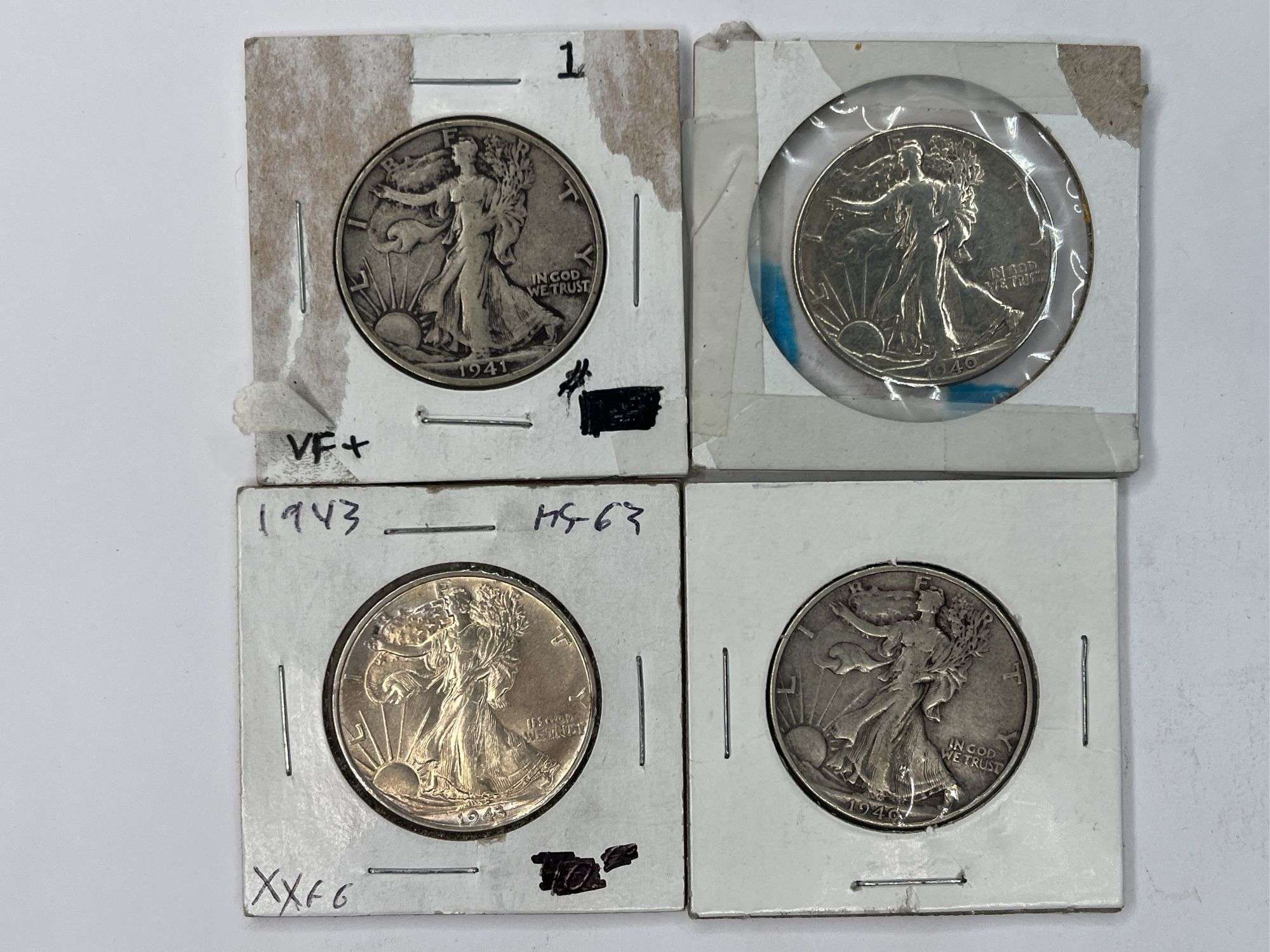 1940, 1940, 1941, 1943 Walking Liberty Half Dollars - Kaufman Realty & Auctions