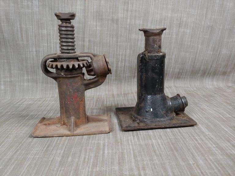 2 cast iron screw jacks - Kaufman Realty & Auctions