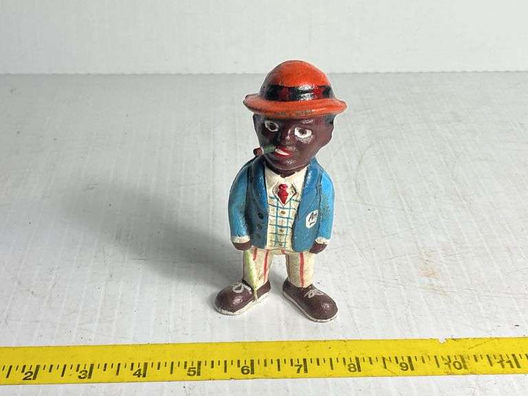 Vintage Cast Iron Jazz Man Coin Bank - Kaufman Realty & Auctions