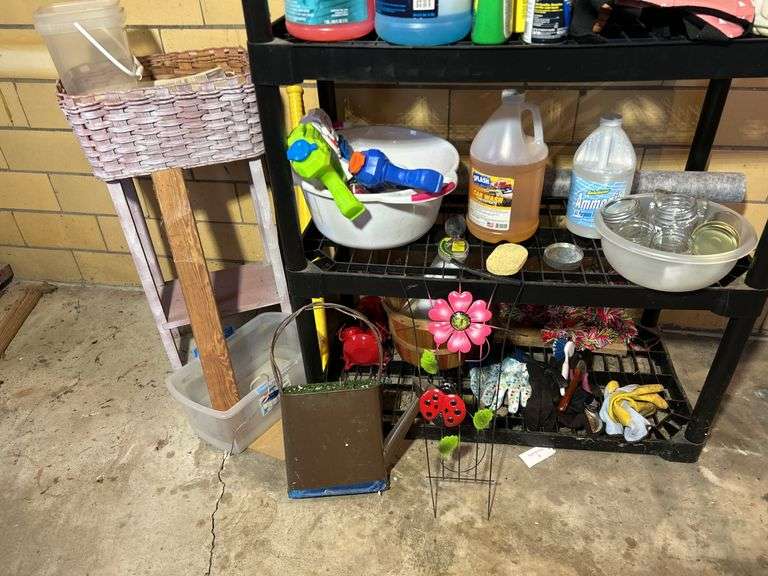 Contents of bottom shelves and stand w/ basket, plastic baseball bats ...