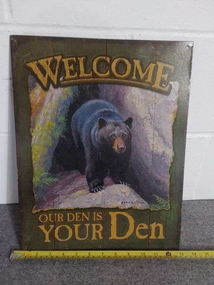 WELCOME OUR DEN IS YOUR DEN TIN SIGN - Kaufman Realty & Auctions