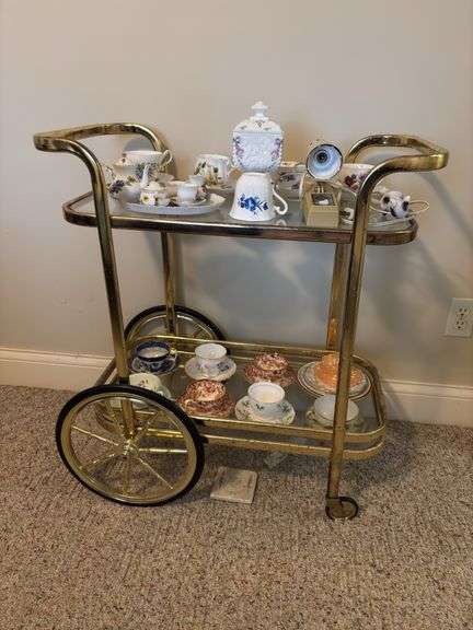 Metal tea cart w/ tea cups & Saucers 29”W 32” H - Kaufman Realty & Auctions