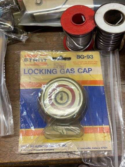 lot of hardware and tools- Locking gas caps, screen hangers, rivet ...