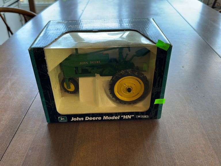 John Deere HN - Kaufman Realty & Auctions