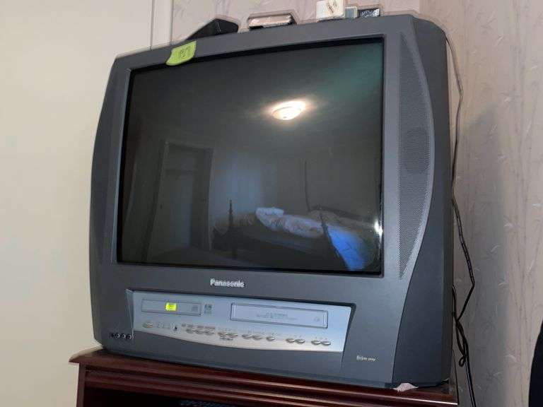 PANASONIC TV WITH BUILT IN VHS/DVD PLAYER - Kaufman Realty & Auctions