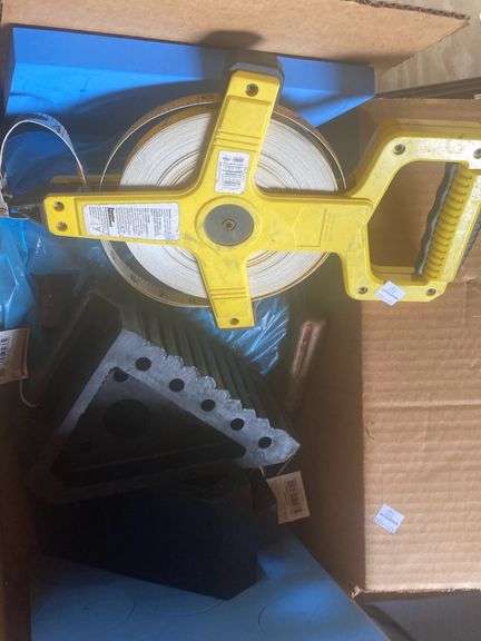 100’ Tape Measure, Wheel Chocks and More - Kaufman Realty & Auctions