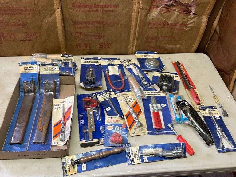 Large lot of packaged tools including front wheel drive pliers ...
