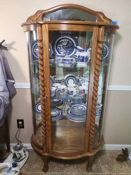 HARDWOOD CURVED CURIO CABINET - Kaufman Realty & Auctions