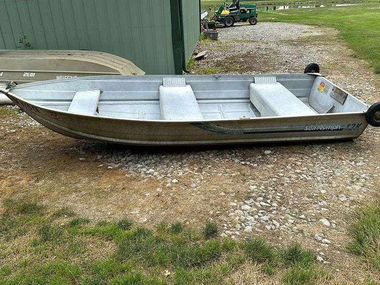 12 FT SEA NYMPH ALUMINUM BOAT - Kaufman Realty & Auctions