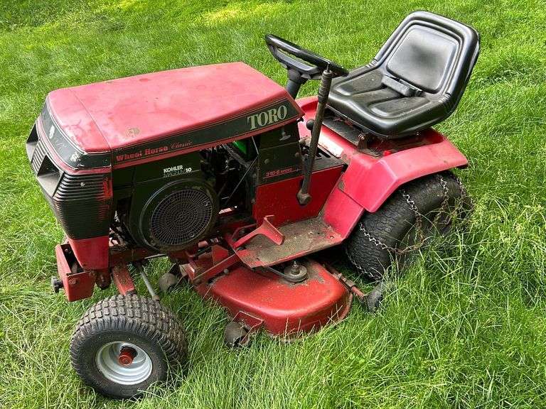 Toro 310-8 speed Wheel Horse tractor w/ tire chains- - Kaufman Realty ...