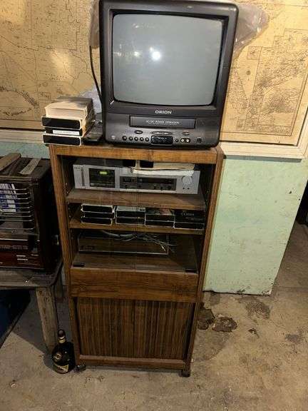 ROLLING TV CABINET WITH TV, VHS, AUDIO CASSETTE PLAYER - Kaufman Realty ...