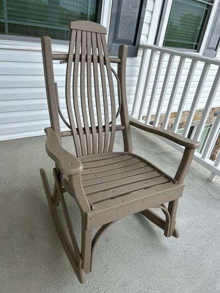 Tan rocker - missing part of seat - Kaufman Realty & Auctions