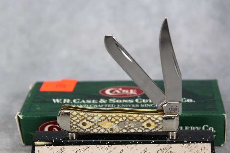 2005 CASE XX RATTLESNAKE BONE TINY TRAPPER - Kaufman Realty & Auctions