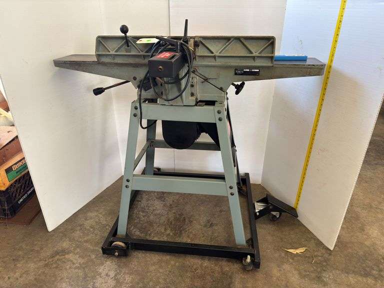 Delta 6” Jointer on Stand, Extra Knives - Kaufman Realty & Auctions
