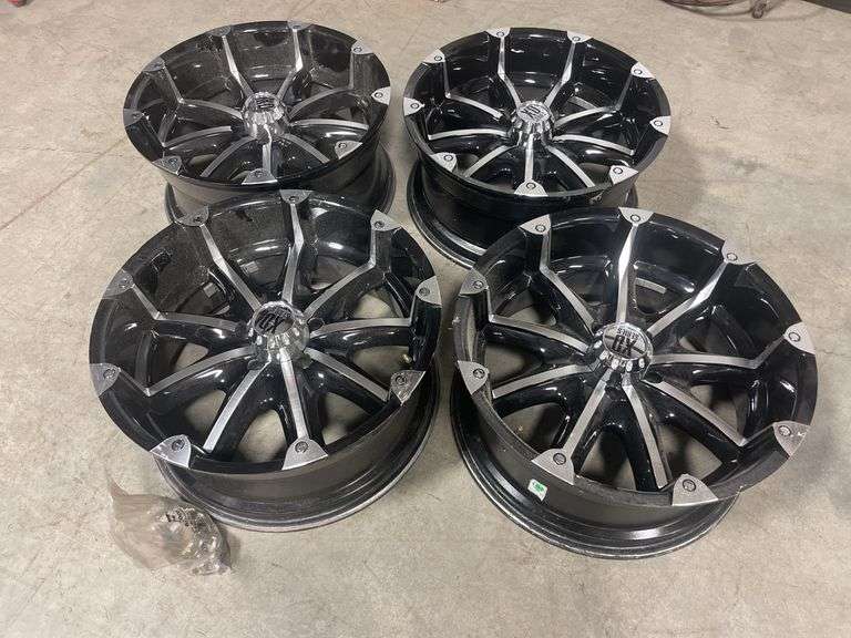 (4) XD series tire rims - Kaufman Realty & Auctions