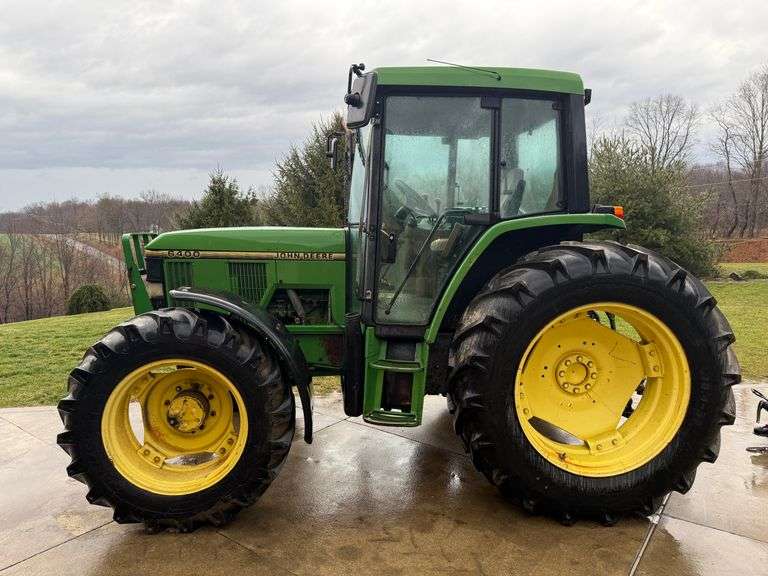 John Deere 6400 Tractor 4WD 2 rear remotes - Kaufman Realty & Auctions