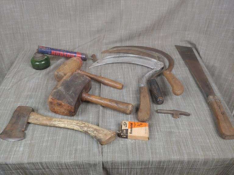 Tool lot includes scythes machete Hatchet,wooden mallets and a Hudson ...