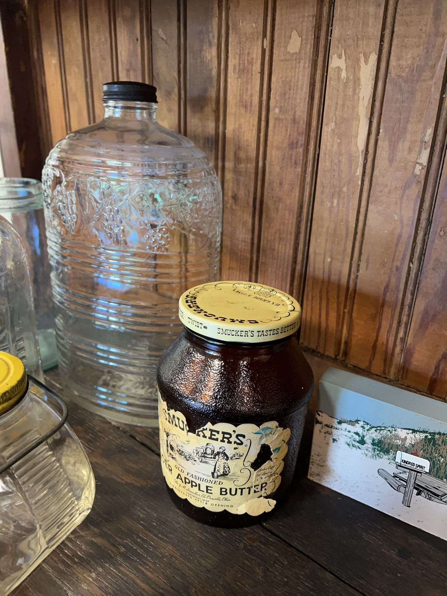 Contents of cabinet- glass jars, pitcher, misc - Kaufman Realty & Auctions