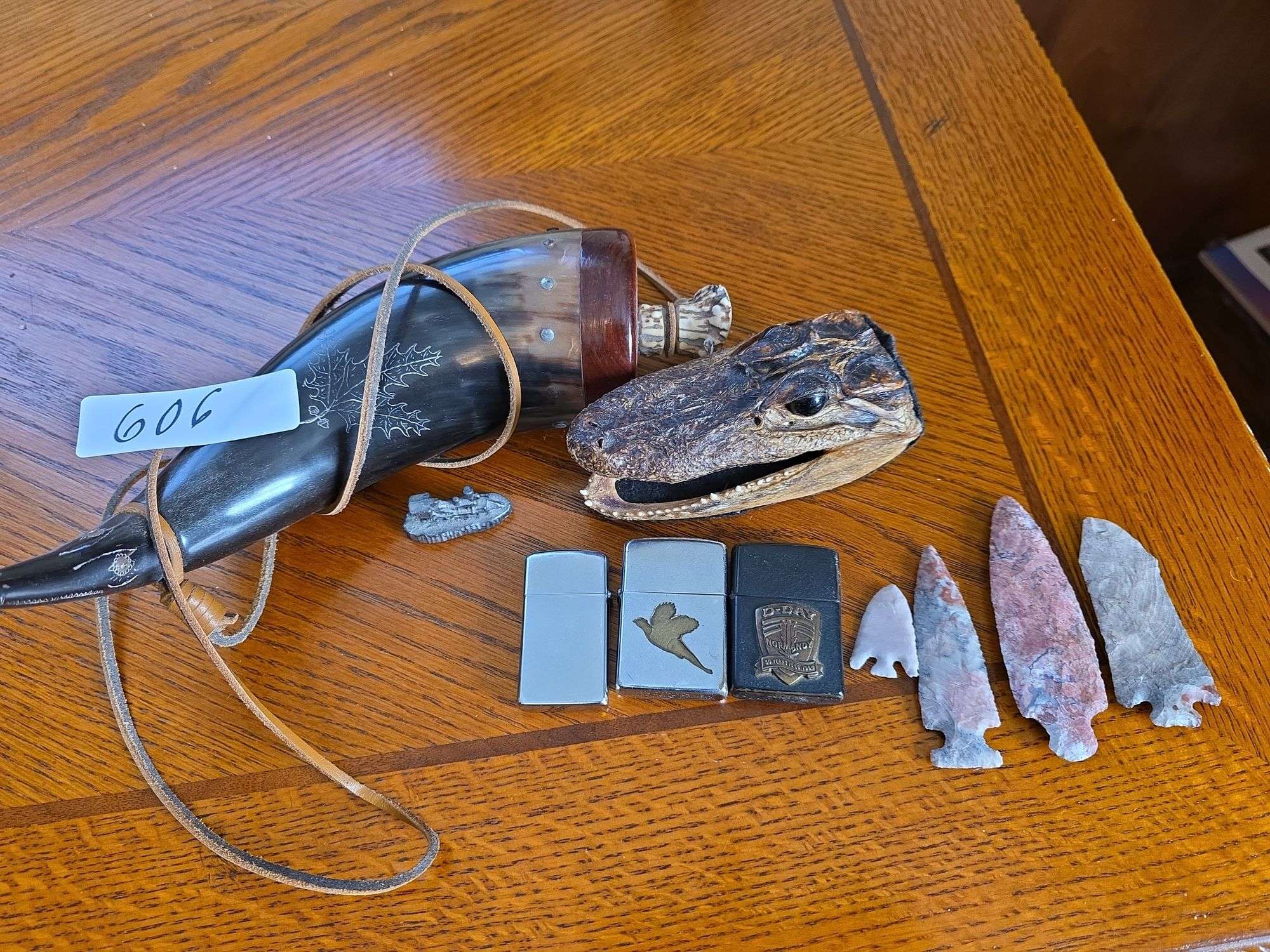 Powder horn, gator head, lighters & arrowheads - Kaufman Realty & Auctions