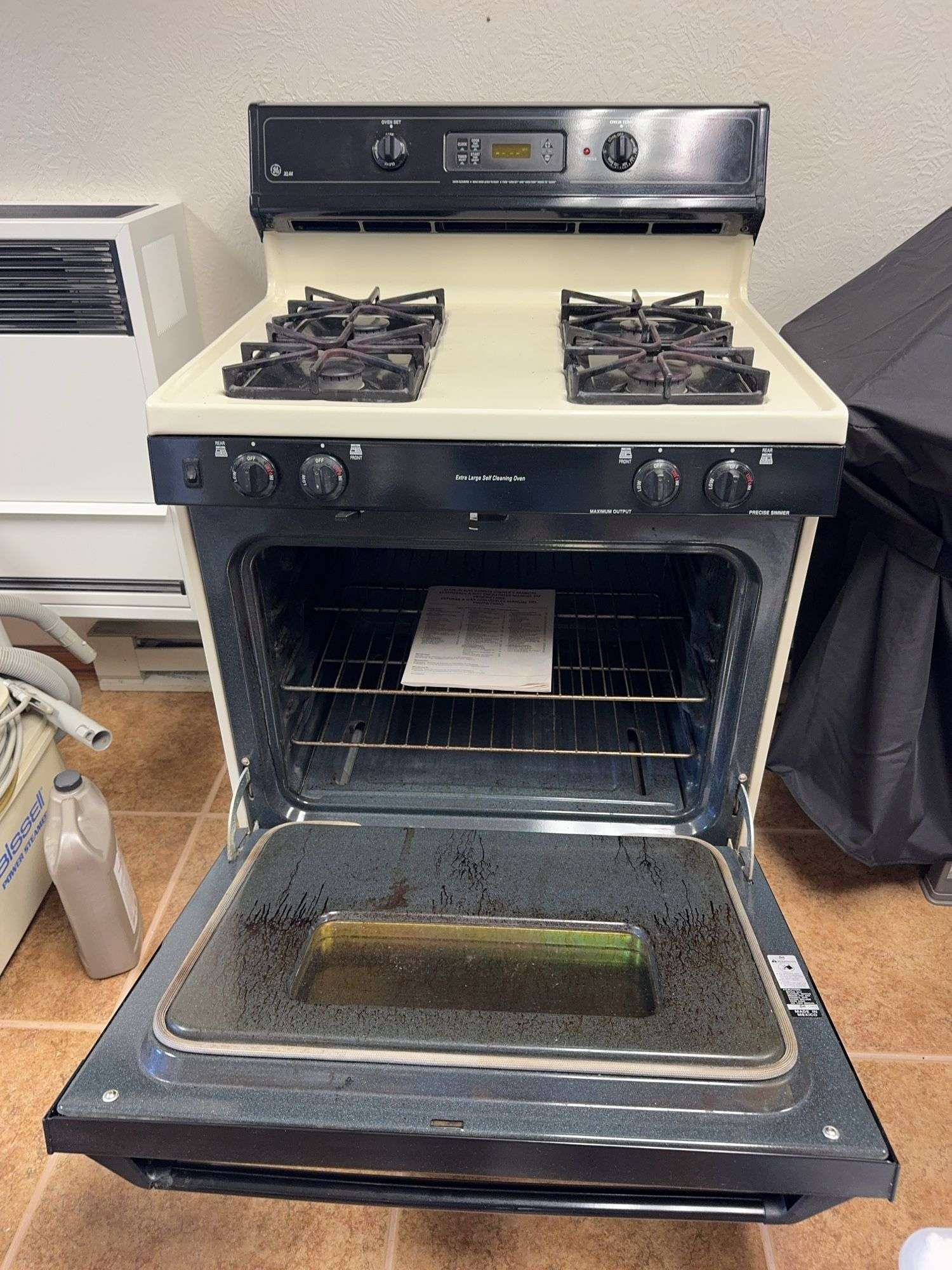 General Electric XL44 Gas Range - Kaufman Realty & Auctions
