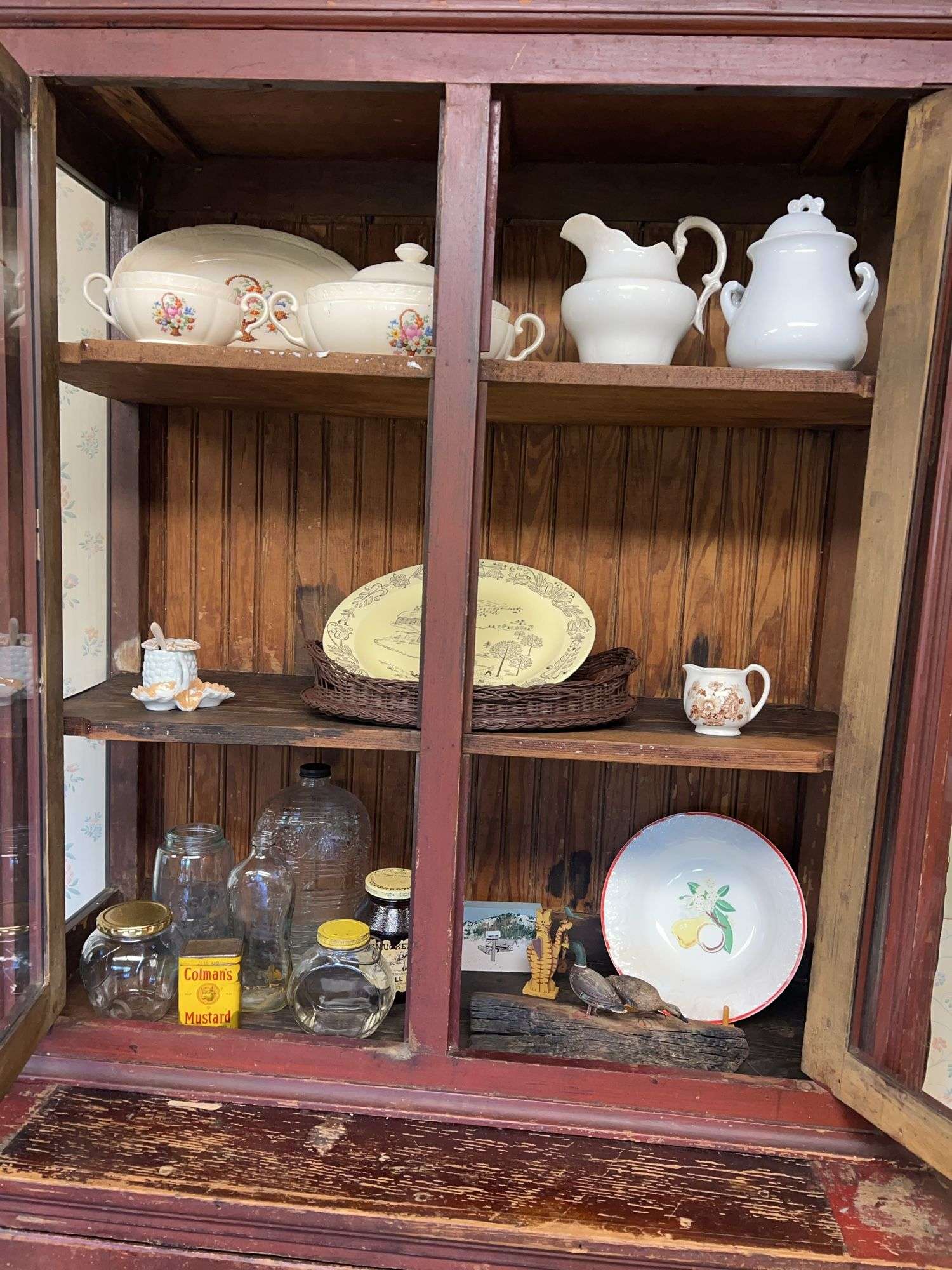 Contents of cabinet- glass jars, pitcher, misc - Kaufman Realty & Auctions
