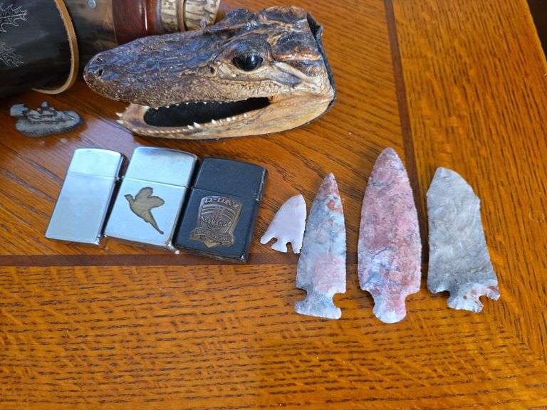 Powder horn, gator head, lighters & arrowheads - Kaufman Realty & Auctions