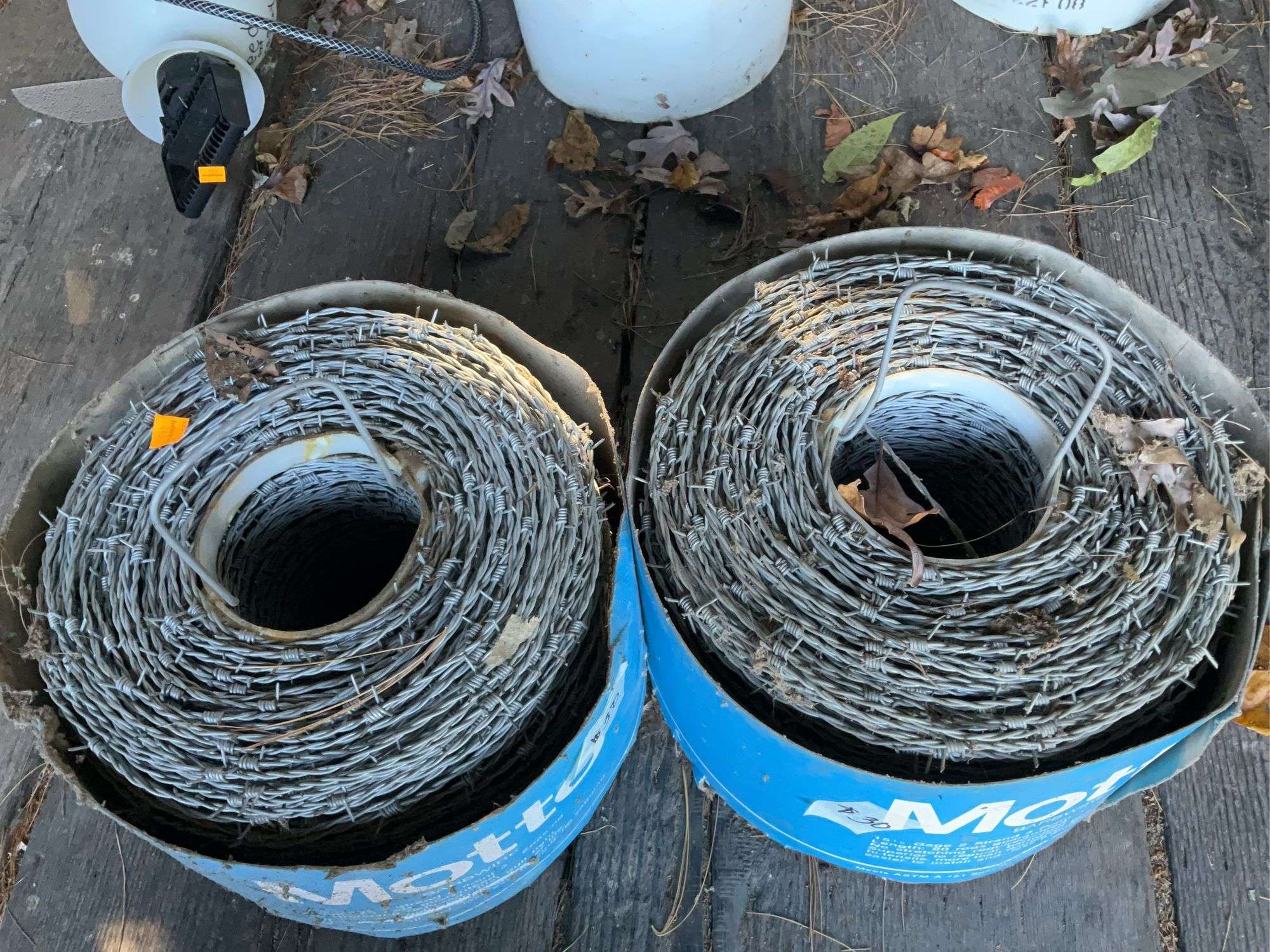 2 Rolls Barb Wire Fence - Kaufman Realty & Auctions