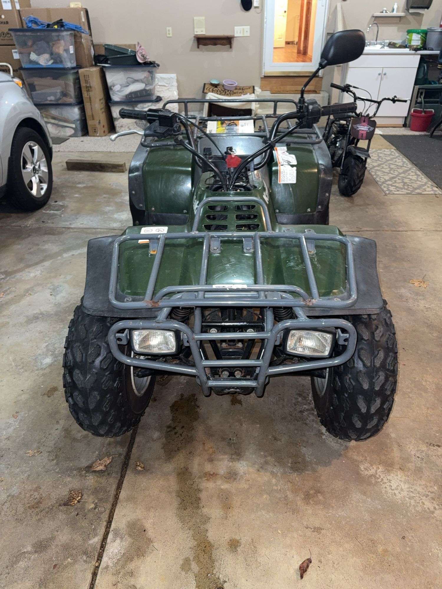 KAWASAKI BAYOU KLF300 2WD & 4WD - Kaufman Realty & Auctions