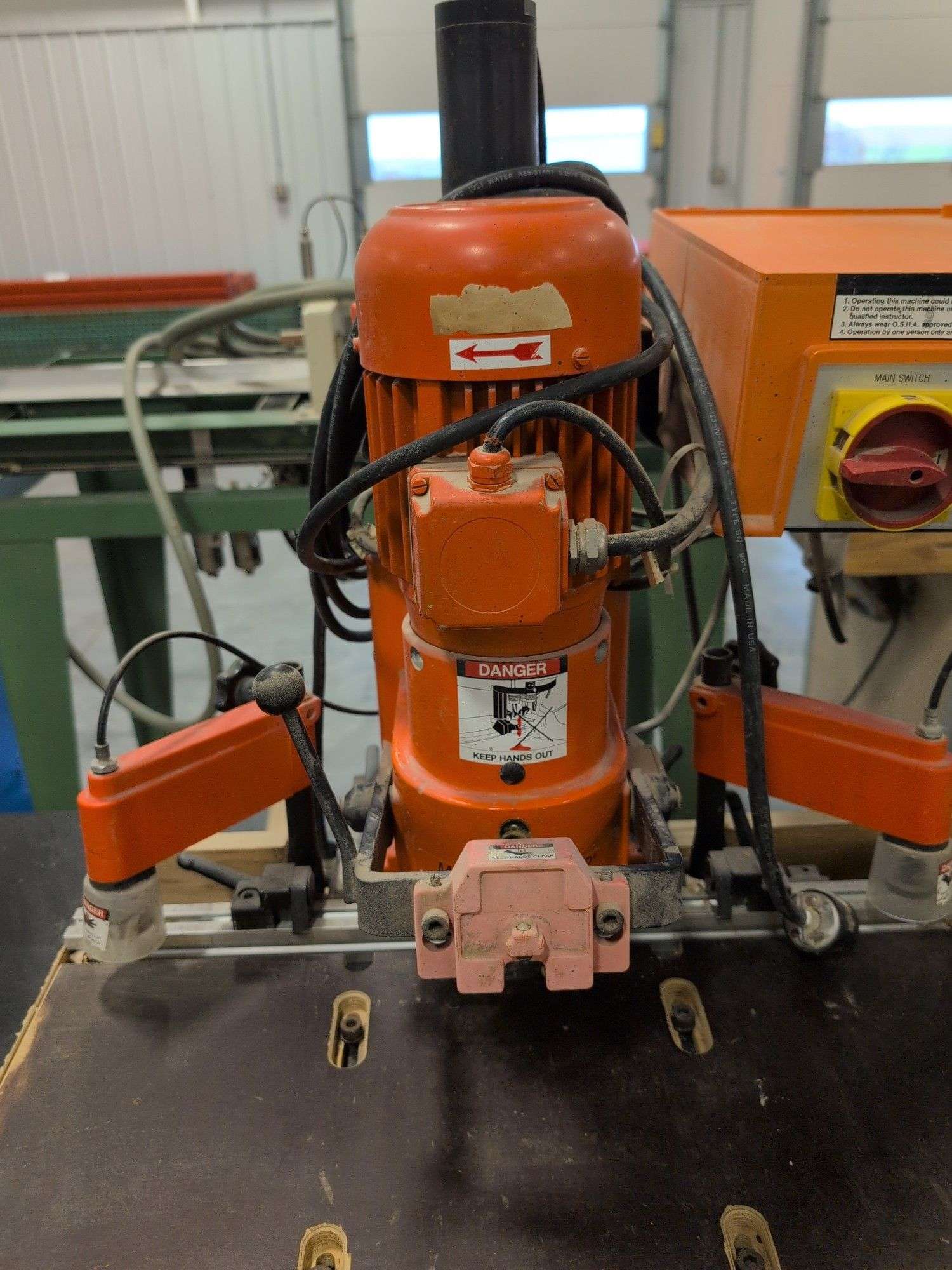 Blum mini press MSP boring and insertion machine on workbench - 7’ long ...