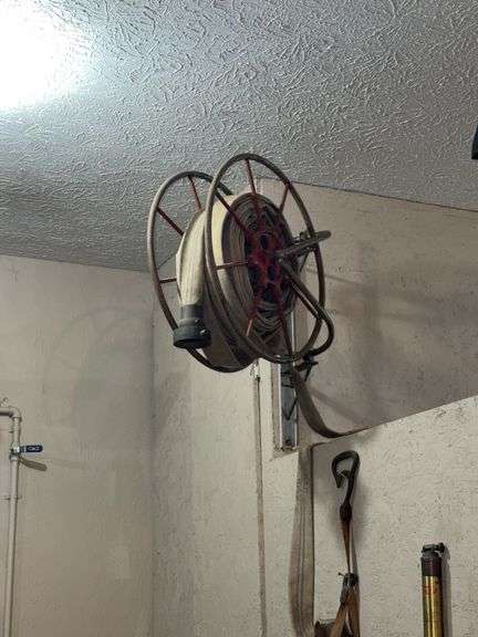 VINTAGE FIRE HOSE AND REEL - Kaufman Realty & Auctions