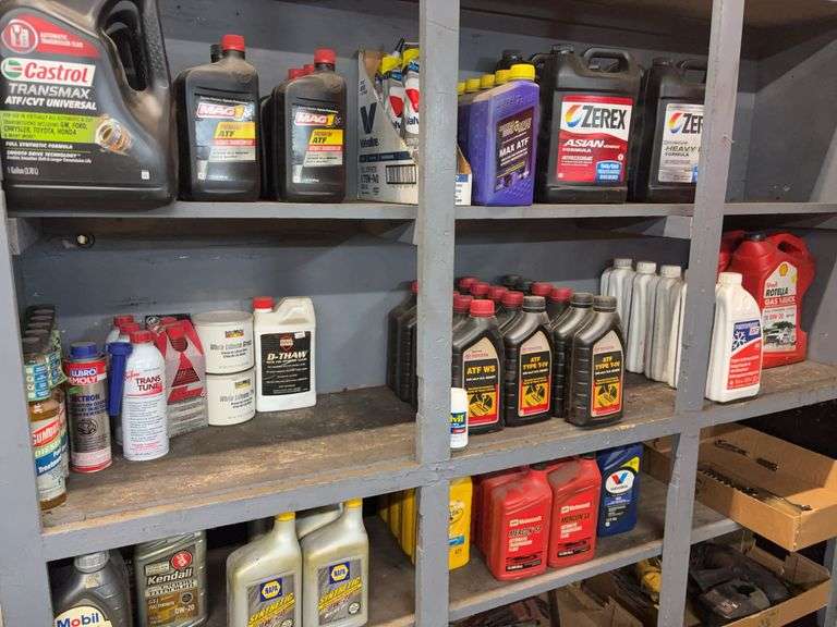 Contents of shelf including fuel treatment, ATF WS, antifreeze & full ...
