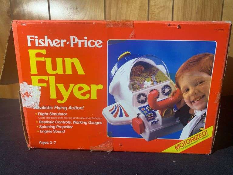FISHER PRICE FUN FLYER IN ORIGINAL BOX - Kaufman Realty & Auctions
