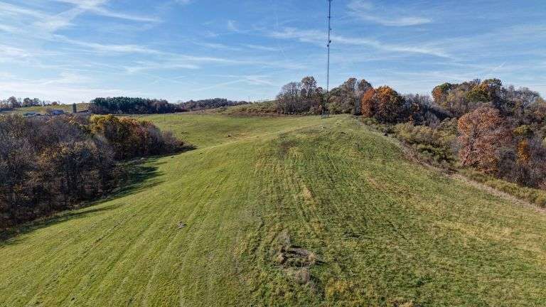 Parcel 5: 26.01 acres. Open and wooded. 60’ frontage on TR 127 ...