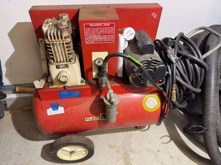 ELECTRIC AIR COMPRESSOR - Kaufman Realty & Auctions