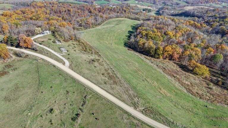 Parcel 5: 26.01 acres. Open and wooded. 60’ frontage on TR 127 ...
