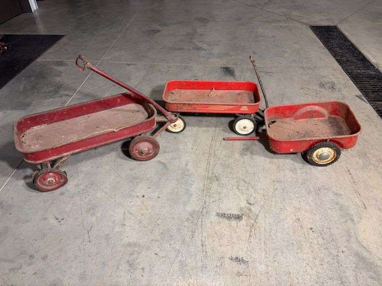 3 red wagons- (1) International, (1) MTD 300 - Kaufman Realty & Auctions