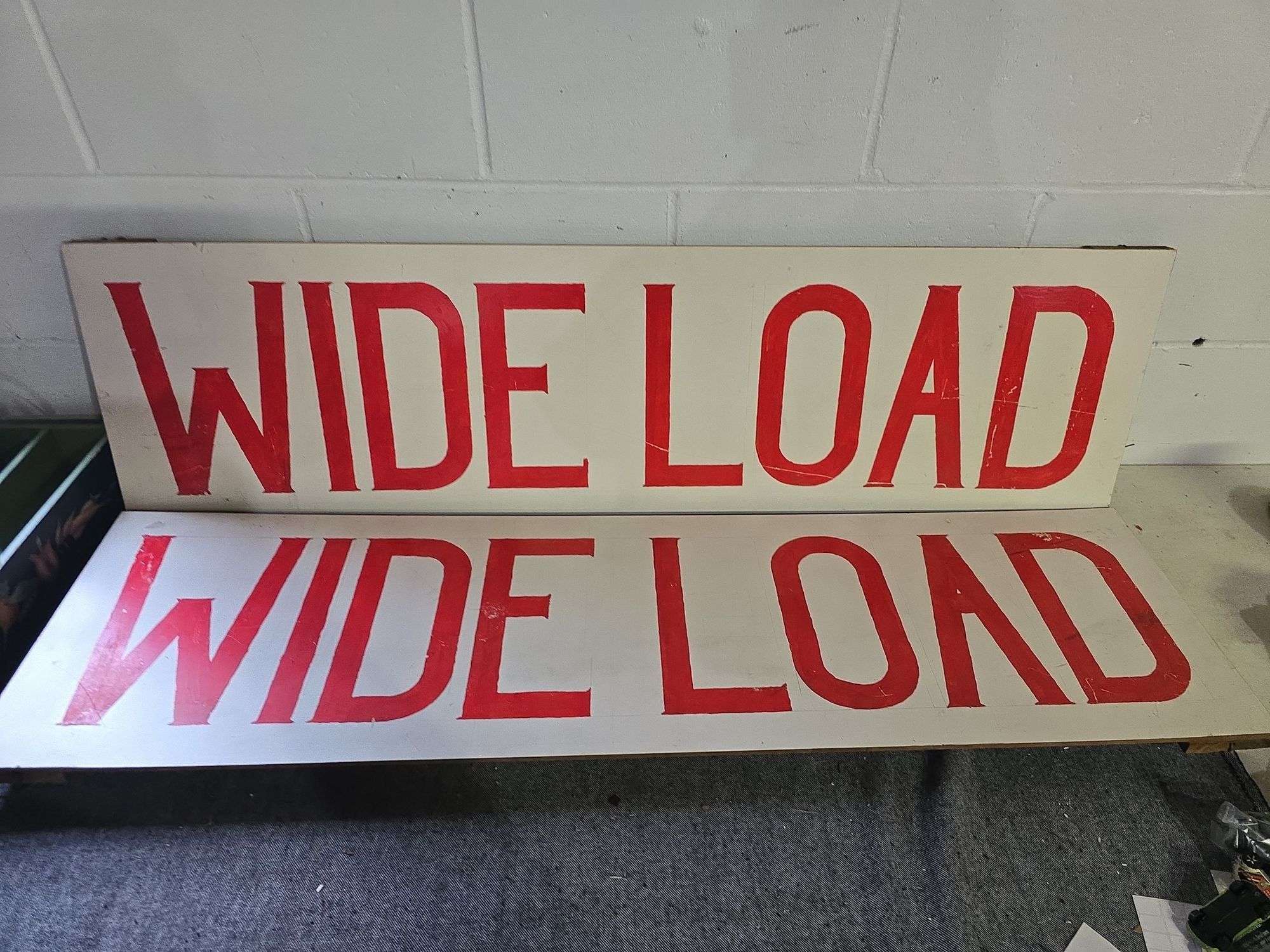 2 WIDE LOAD SIGNS 13.5" X 48" - Kaufman Realty & Auctions