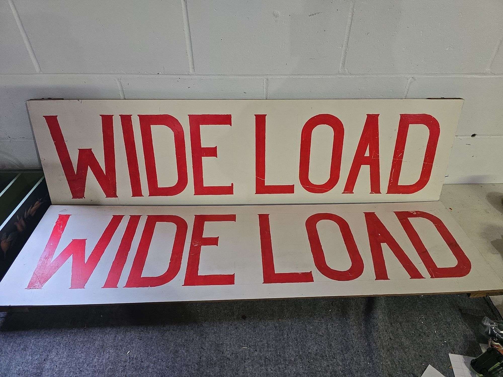 2 WIDE LOAD SIGNS 13.5" X 48" - Kaufman Realty & Auctions