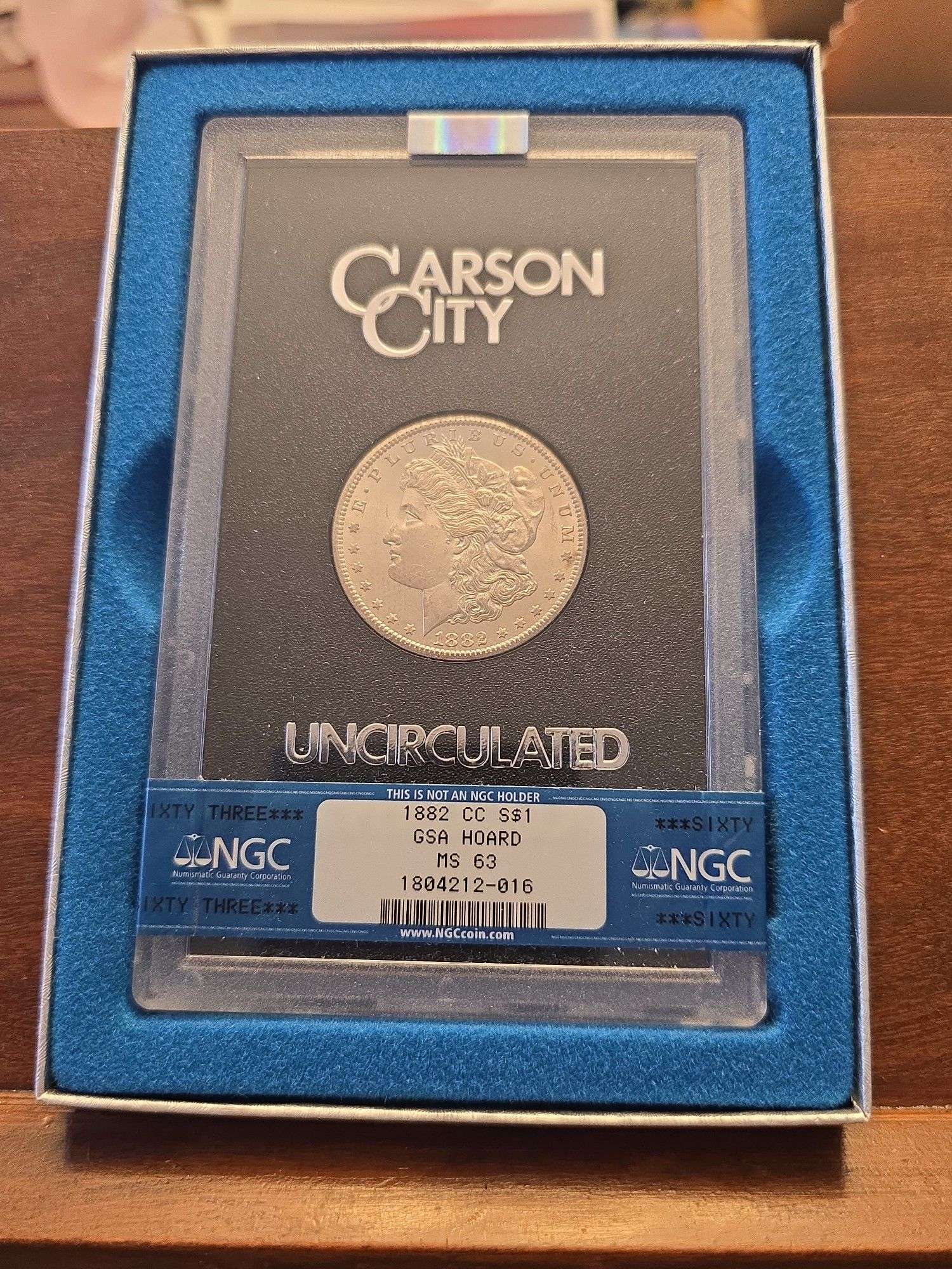 1882CC MORGAN DOLLAR IN GSA HOLDER AND BOX NGC MS63 - Kaufman Realty ...