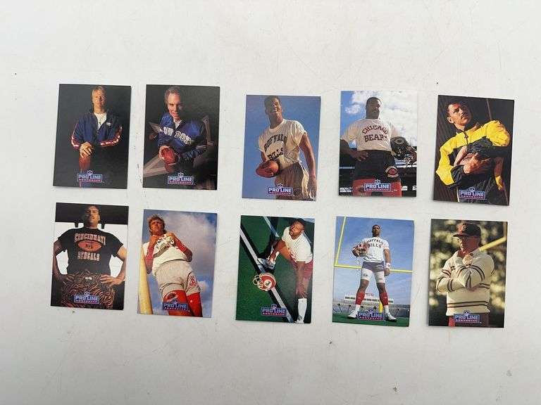 COLLECTION OF FOOTBALL CARDS- PHIL SIMMS, ROGER STAUBACH, ANDRE REED ...