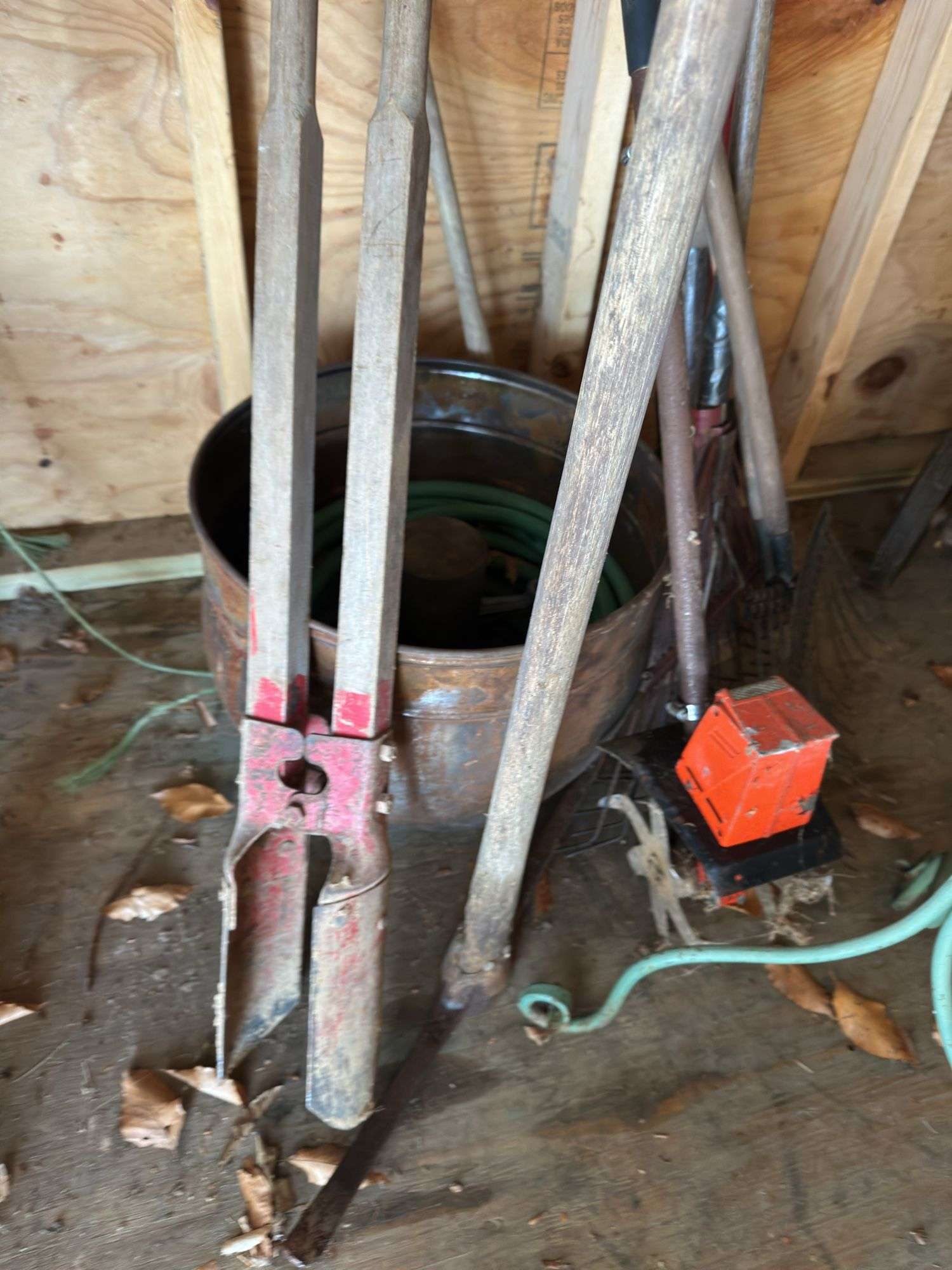 Hand tools, garden hose bucket, post hole digger, rakes, shovels ...