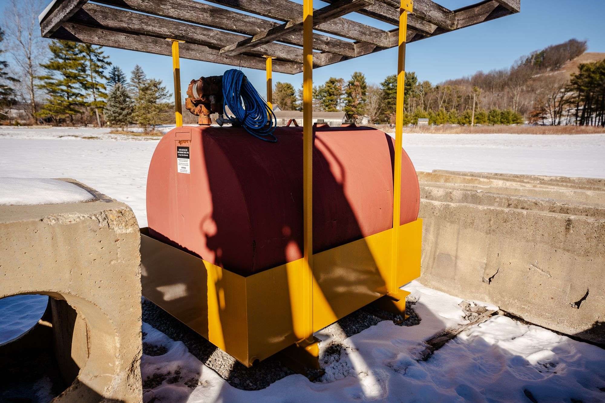 500 Gallon Fuel Tank in Steel Enclosure - Kaufman Realty & Auctions