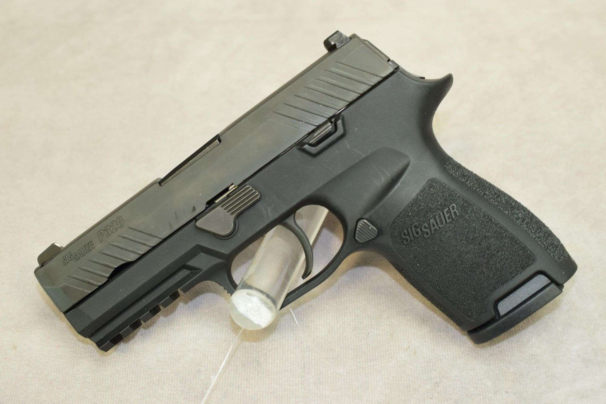 Sig Sauer Mod P320 Cal 9MM 2 Mags - Kaufman Realty & Auctions