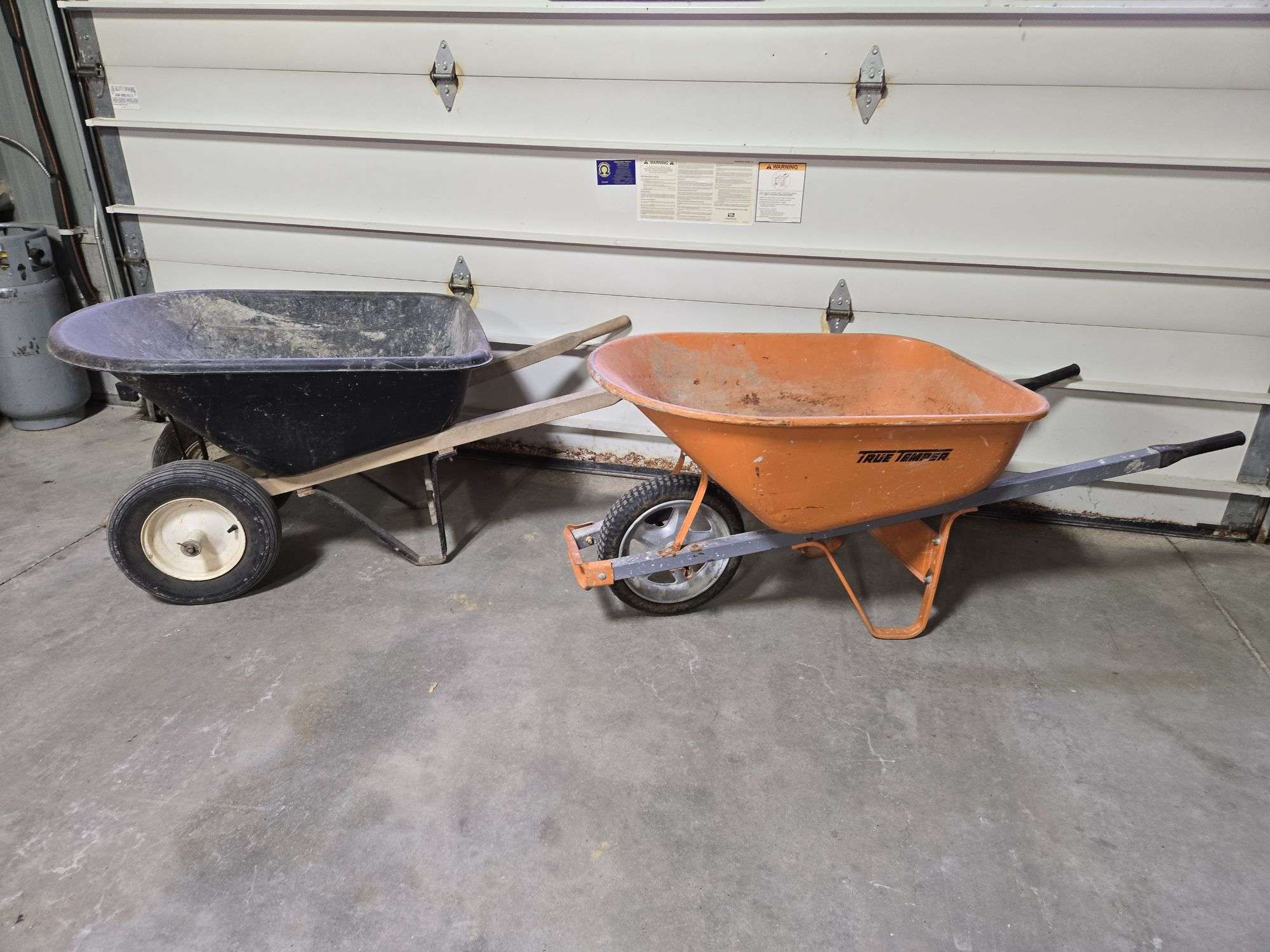 True Temper metal & 2 wheeled wheelbarrows - Kaufman Realty & Auctions