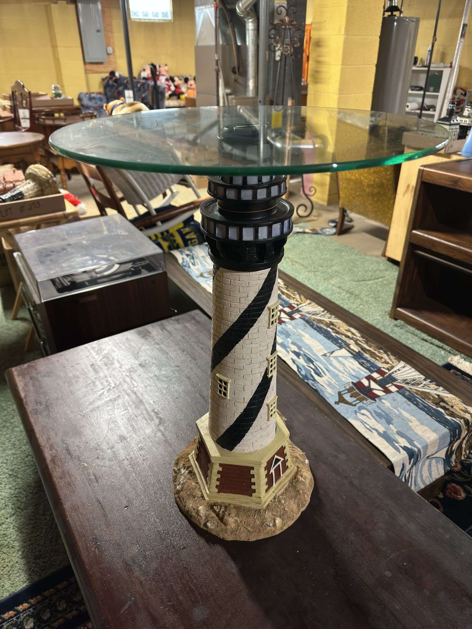 HATTERAS LIGHTHOUSE GLASS TOP TABLE - Kaufman Realty & Auctions